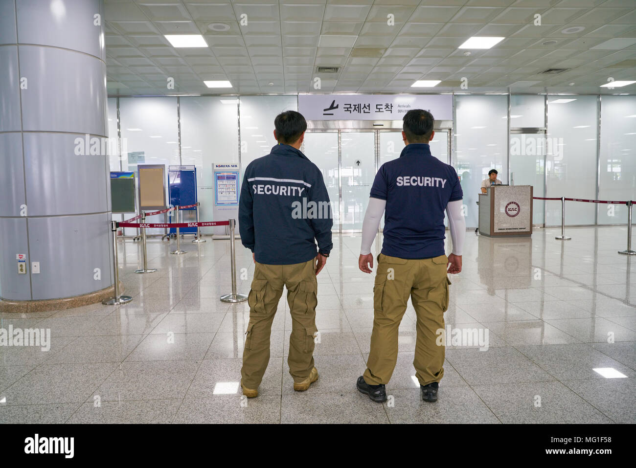 BUSAN, SOUTH KOREA - CIRCA MAY, 2017: airport security staff at Gimhae ...