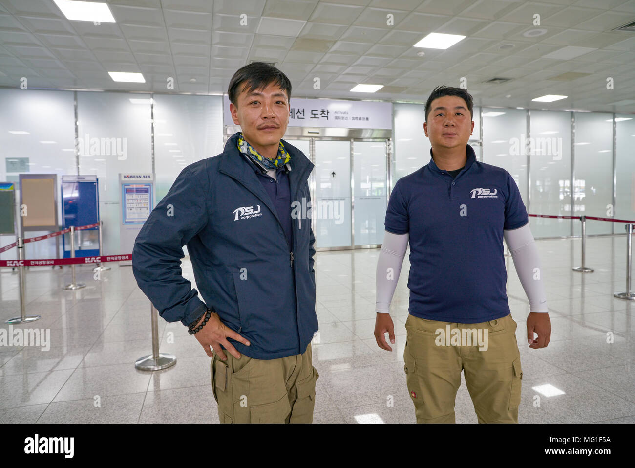 BUSAN, SOUTH KOREA - CIRCA MAY, 2017: airport security staff at Gimhae ...
