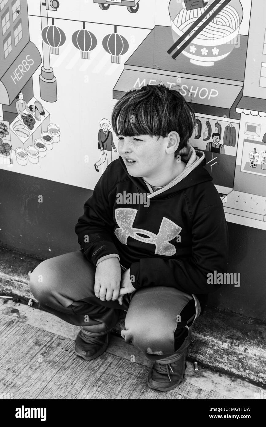 Crouching child Black and White Stock Photos & Images - Alamy