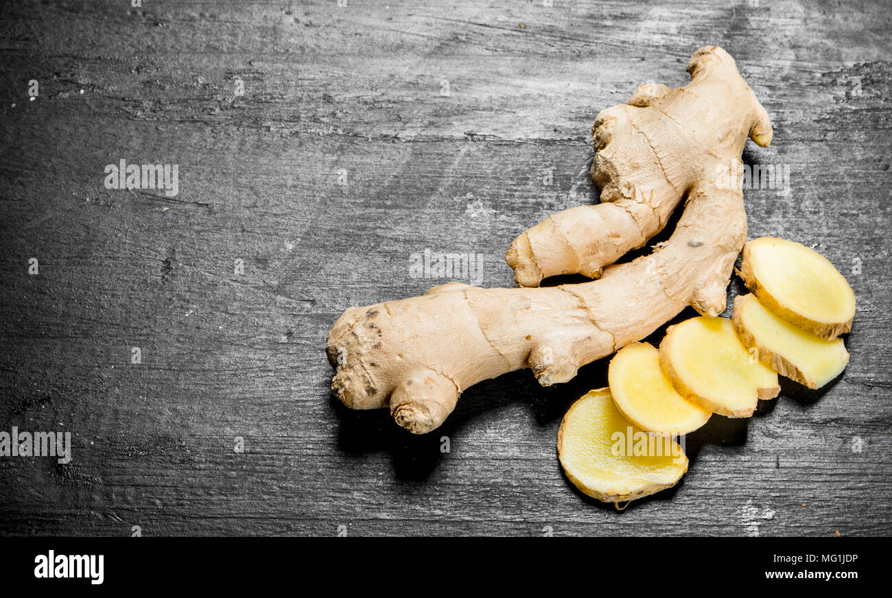Fresh ginger. On the black chalkboard Stock Photo - Alamy