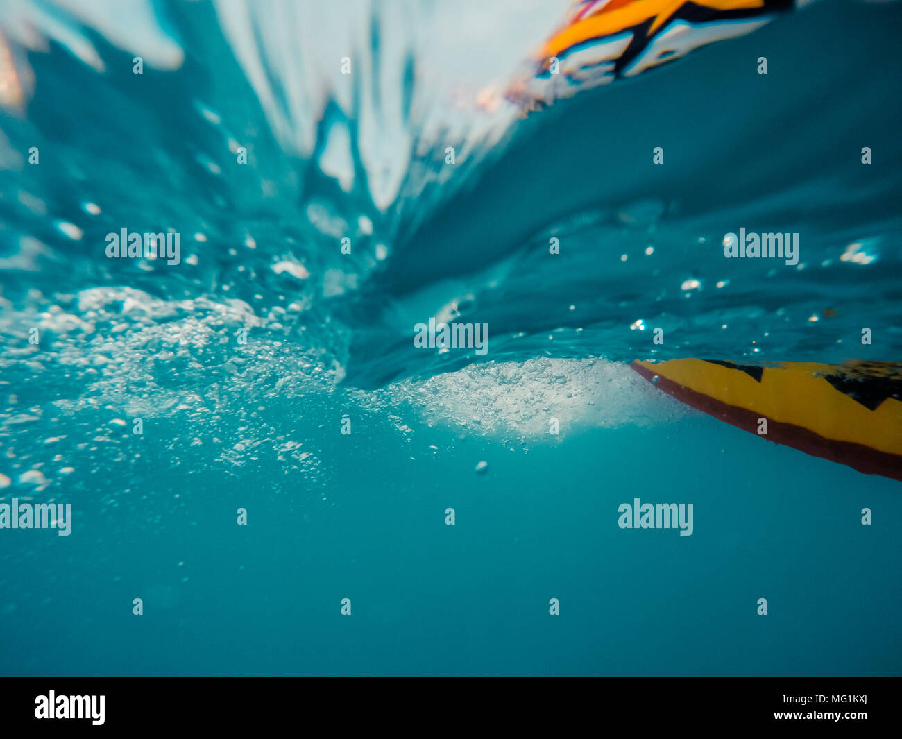 Underwater view of a moving inflatable ring that floating in the water ...