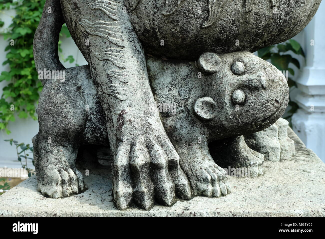 Ancient Lion Cub Statue in Front of Temple Entrance Stock Photo - Alamy
