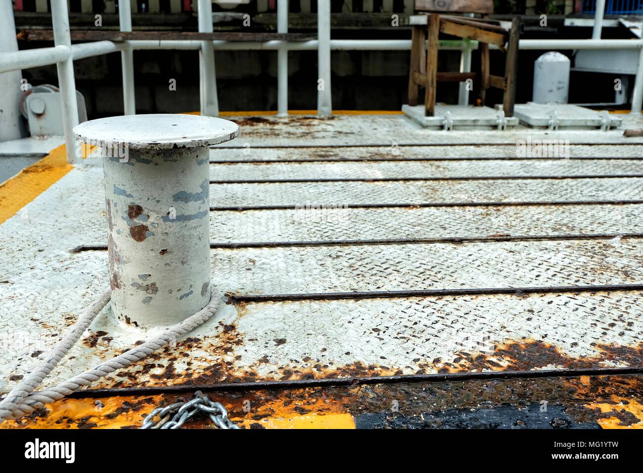 Rusty Mooring Bollard Pole on Pier Stock Photo - Alamy