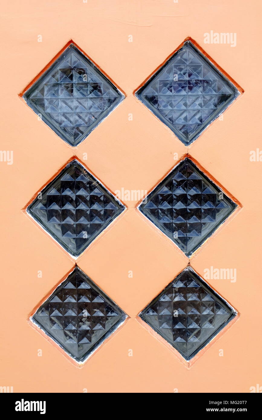 Glass Block on Flesh Tone Concrete Wall Background Stock Photo - Alamy