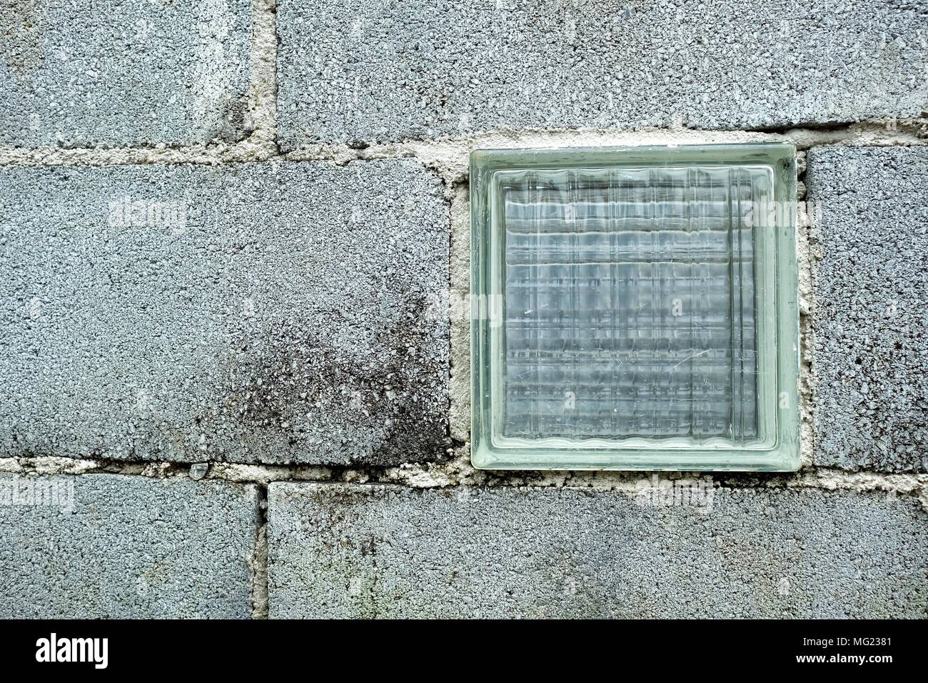 Glass Block on Concrete Wall Stock Photo - Alamy