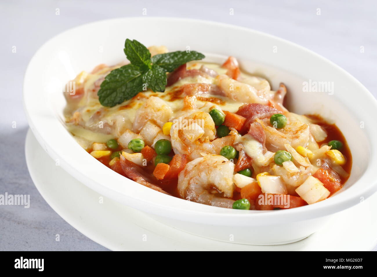 baked seafood risotto Stock Photo - Alamy