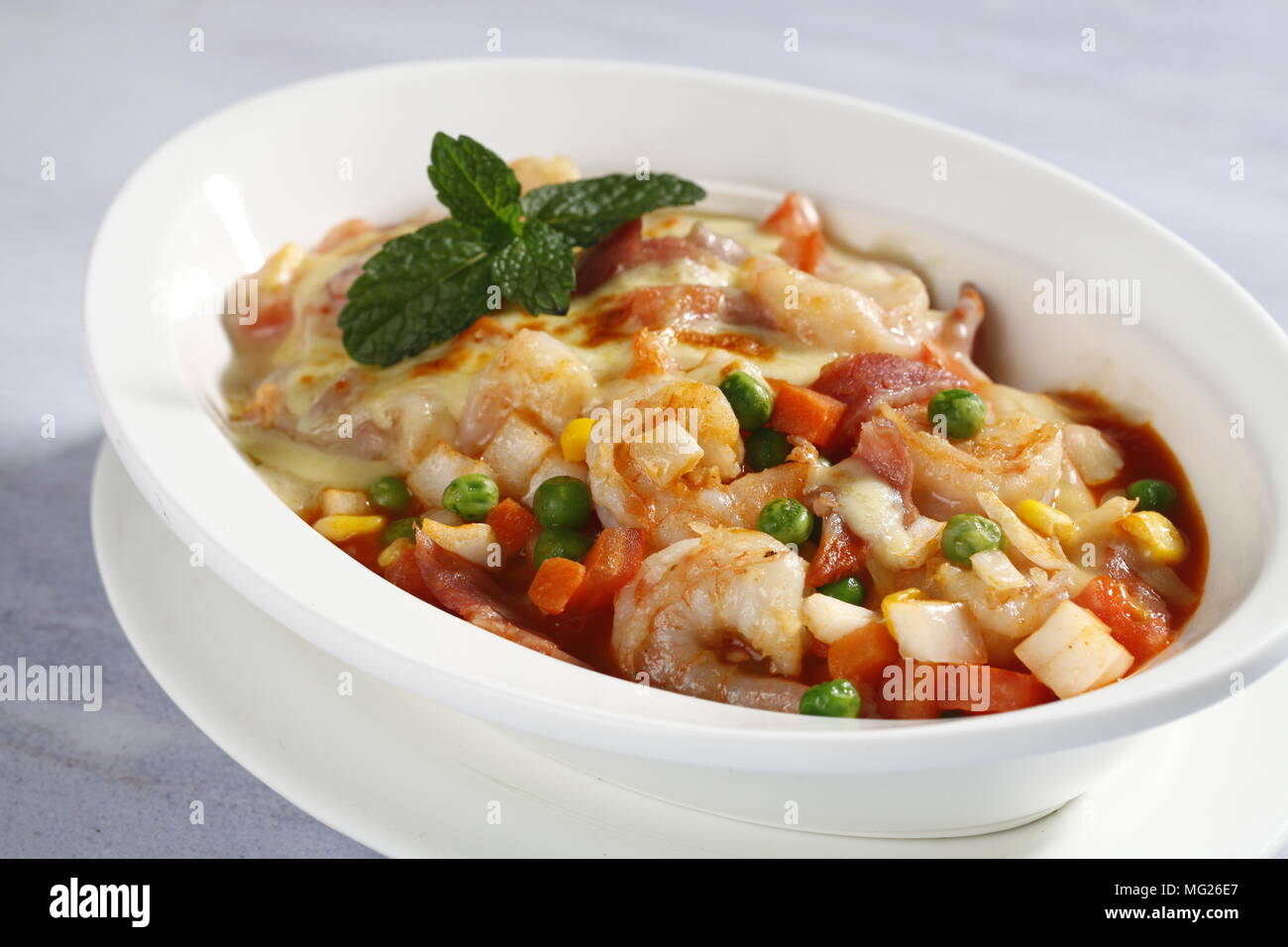 baked seafood risotto Stock Photo - Alamy