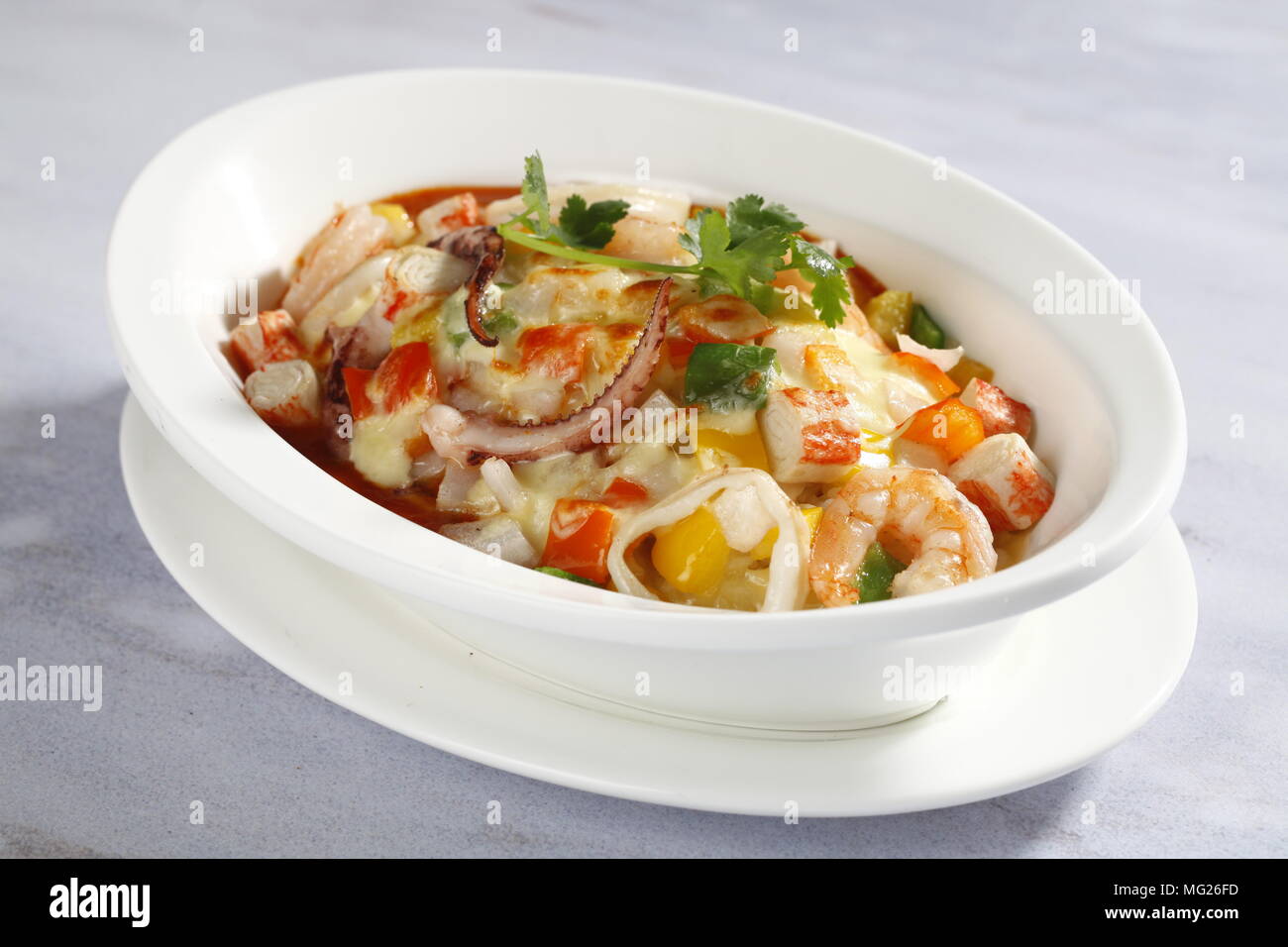 baked seafood risotto Stock Photo - Alamy