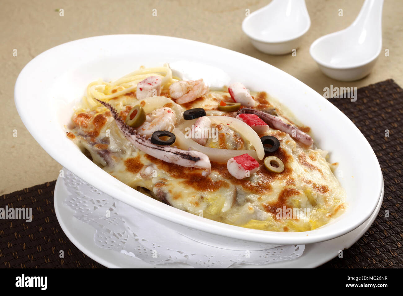 baked seafood risotto Stock Photo - Alamy