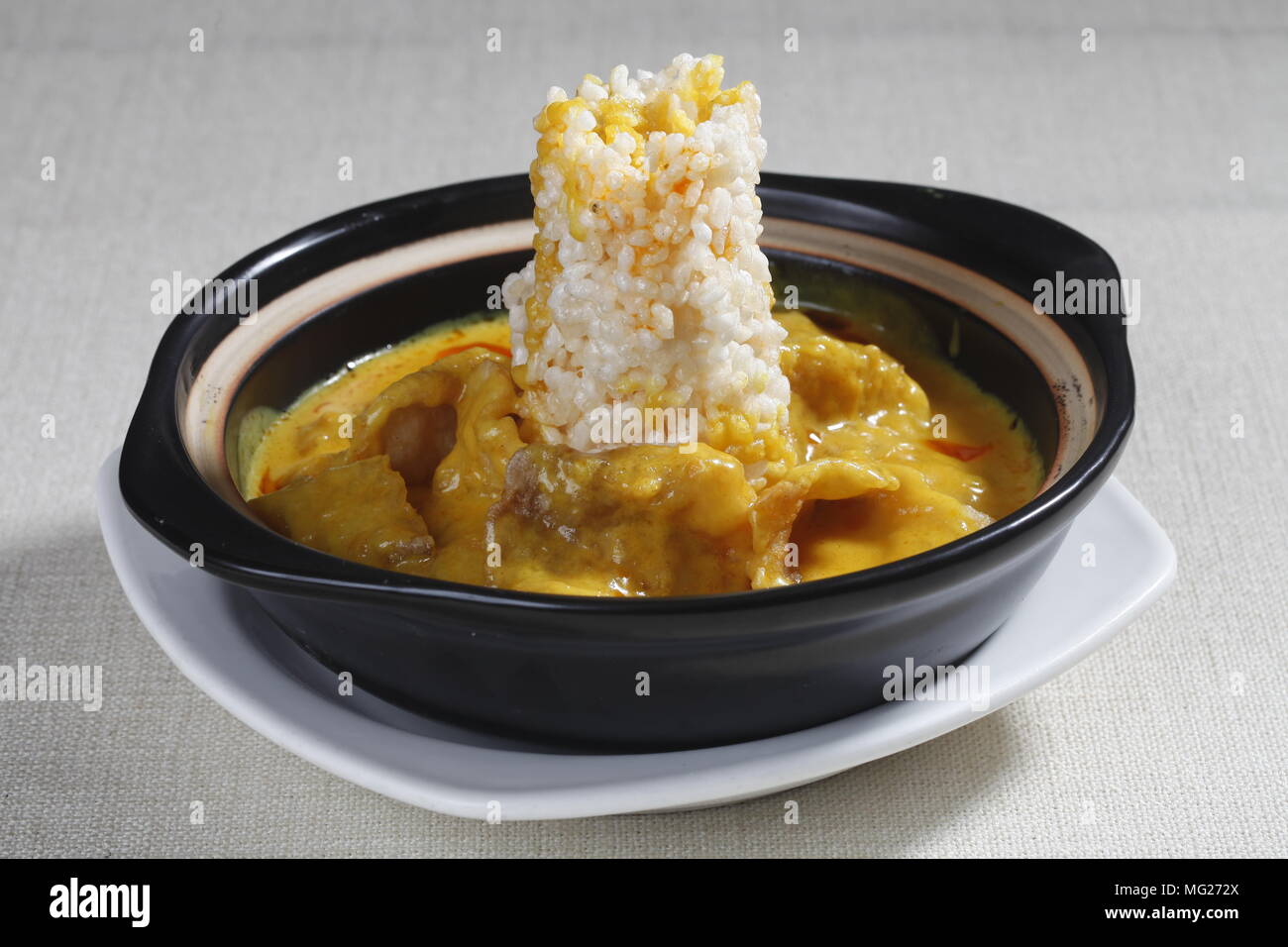 curry fish over rice Stock Photo - Alamy