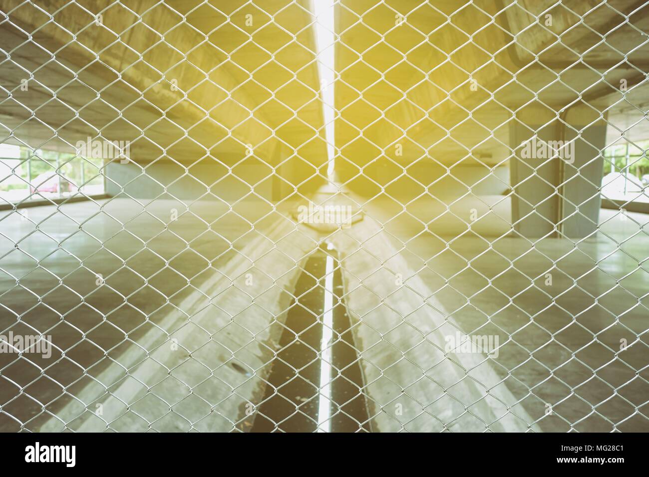 Chain Link Fence with Under Bridge Background Stock Photo - Alamy