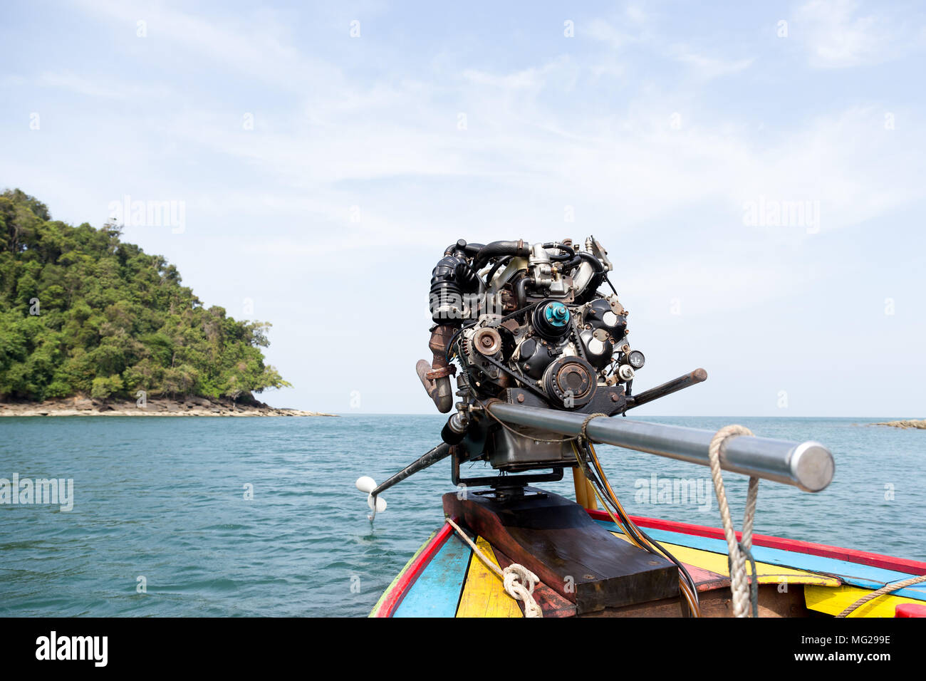 Engine of a long tail boat with blue sky Stock Photo - Alamy