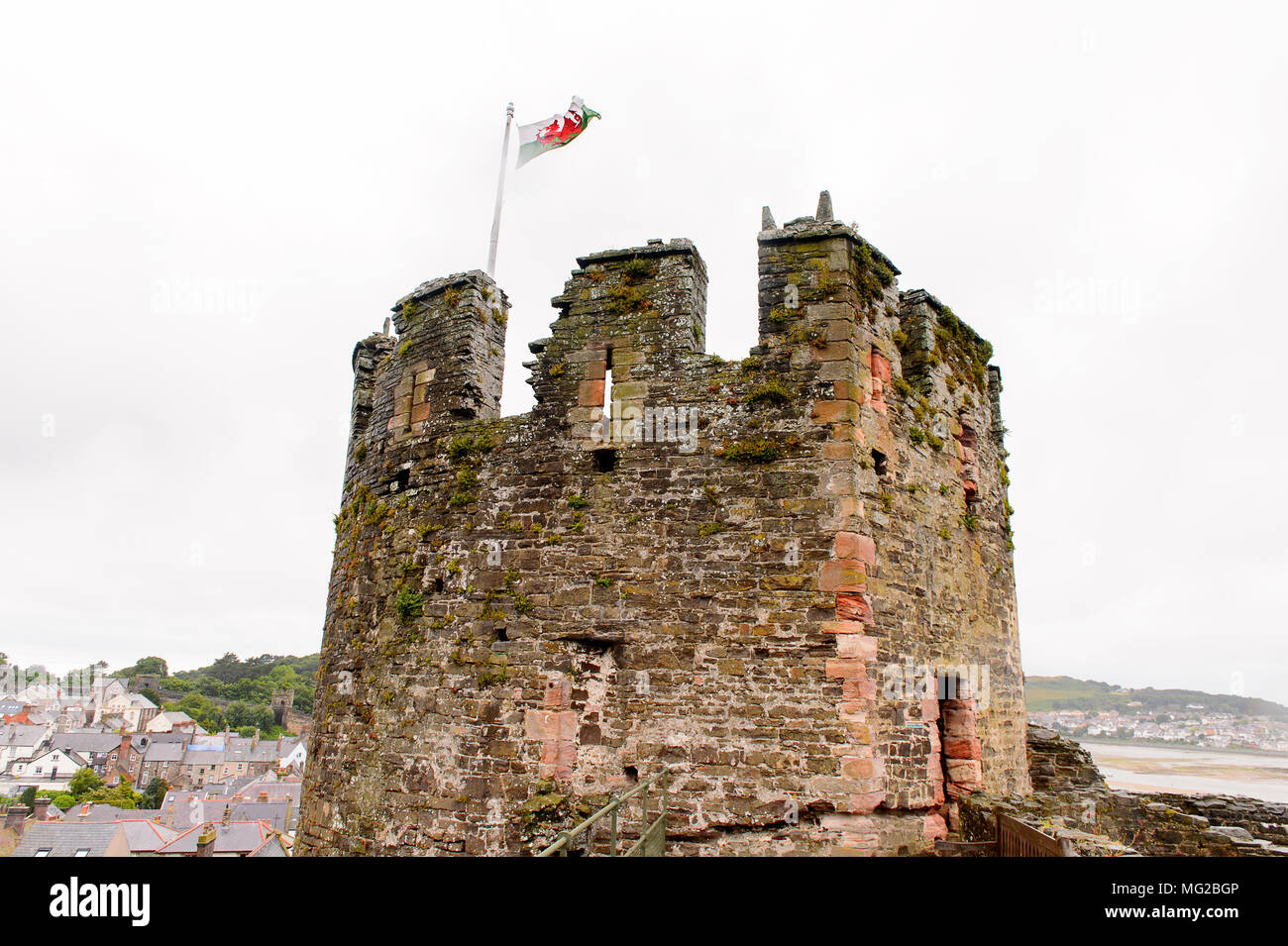 Wales flag on the Conway Castle is a medieval fortification in Conwy ...