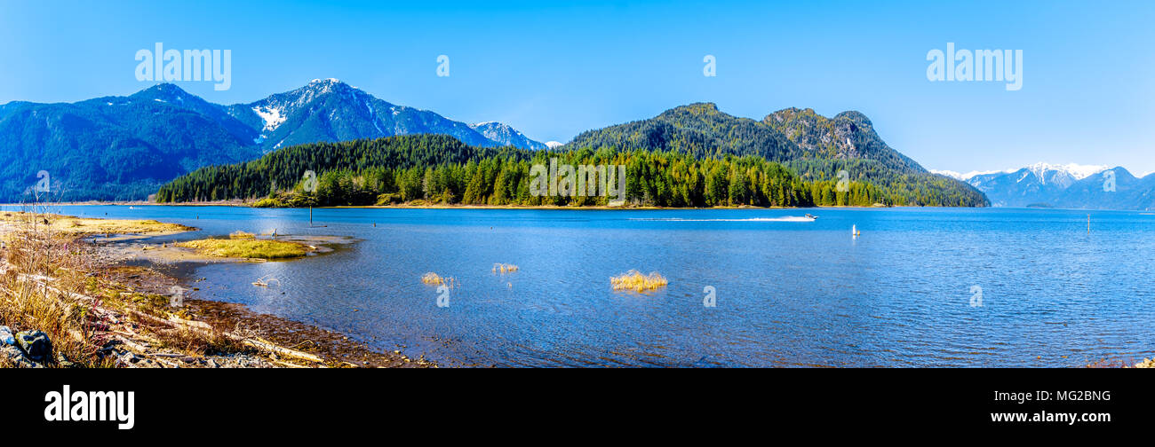 Panorama of a Fishing Boat on Pitt Lake with Snow Capped Peaks of ...