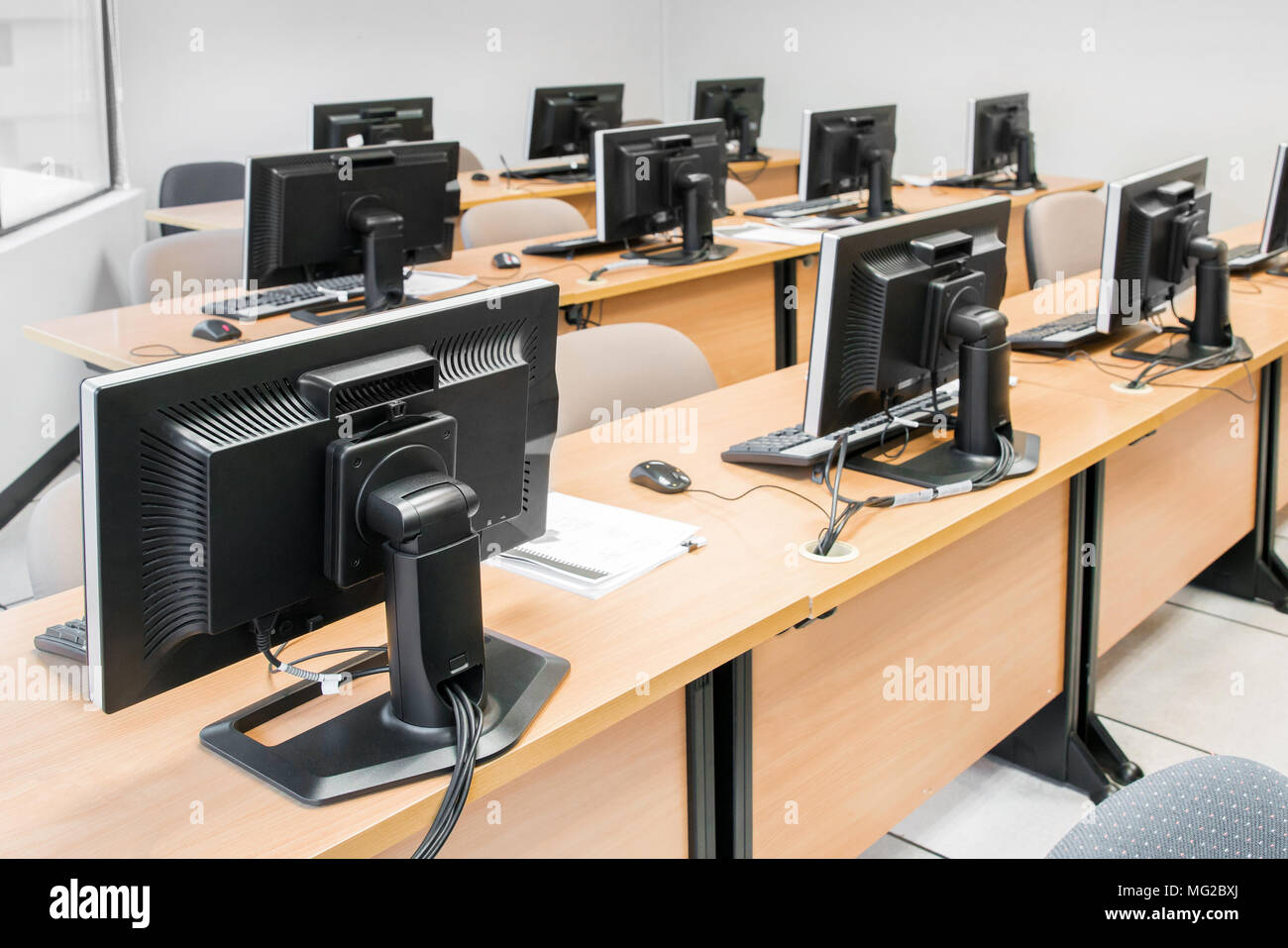 Empty computer room neatly placed for student in a computer lab Stock ...