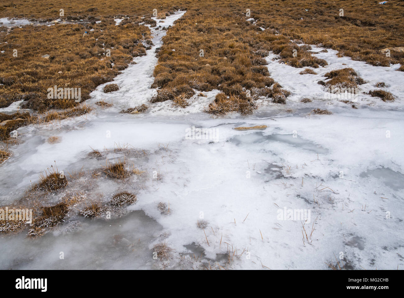 Ice Frozen cover on ground and road at ZERO POINT, Sikkim,India Stock ...