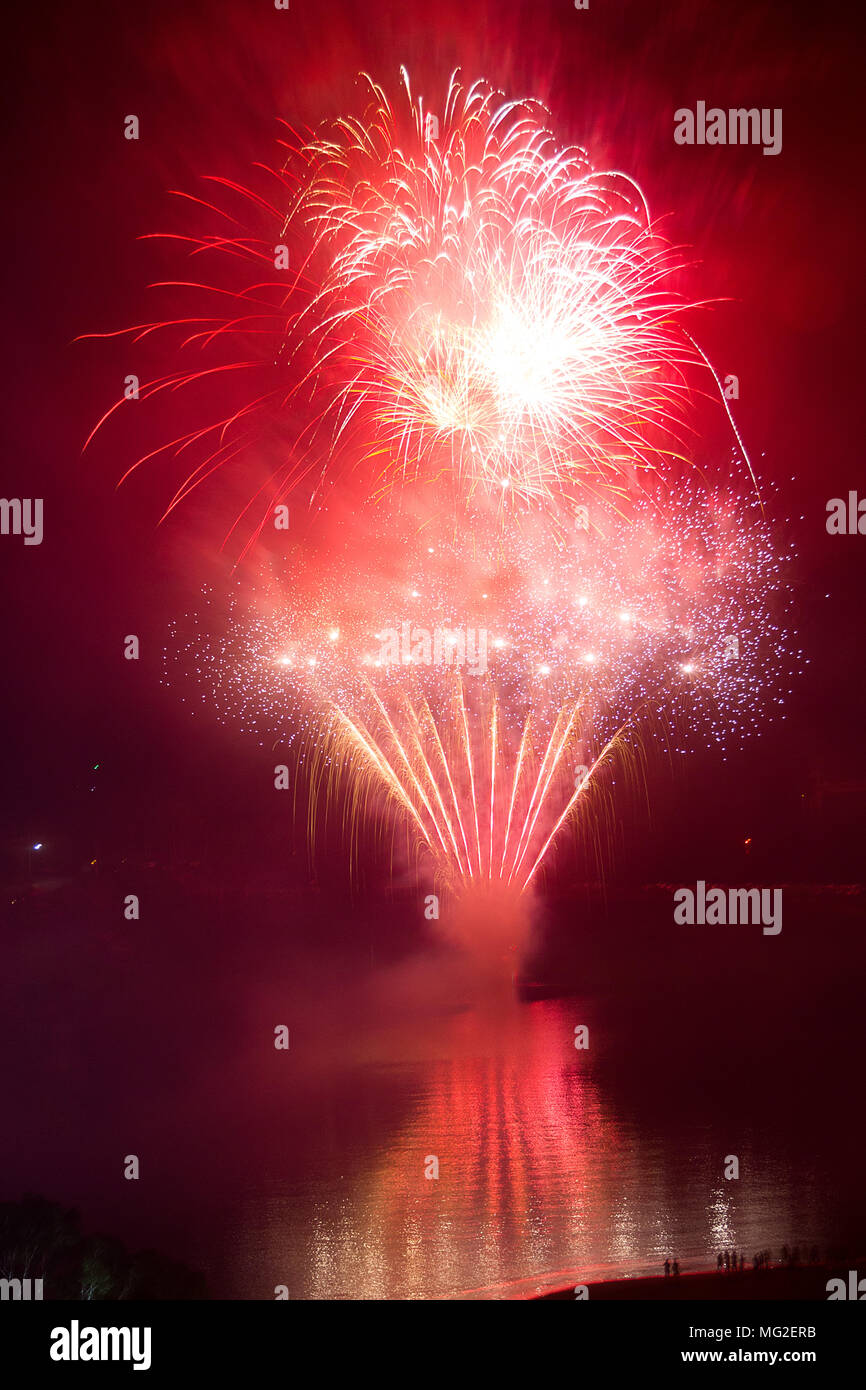 Mid view down of red Fireworks display Stock Photo - Alamy
