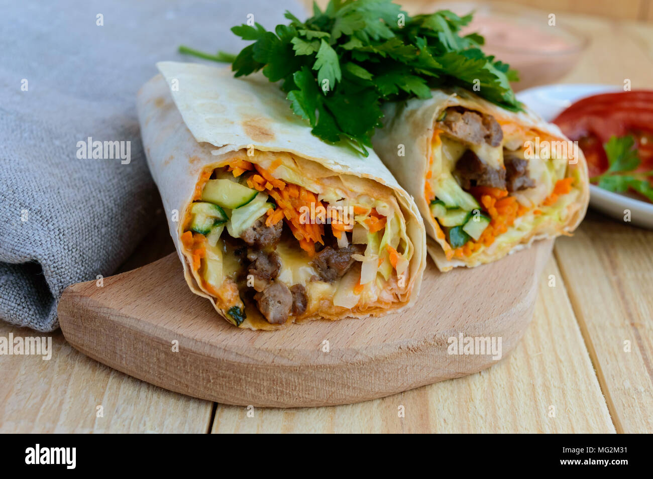 Shawarma - Middle East (Arabic) dish of pita (lavash) stuffed with ...