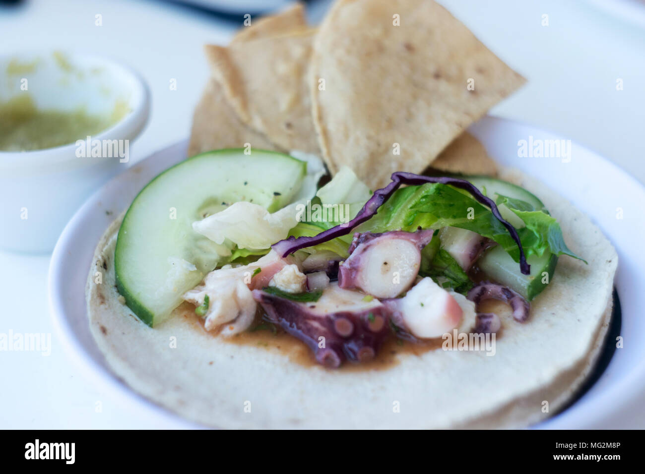 Traditional Octopus Tacos with Onion, Coriander, and Lime Stock Photo ...
