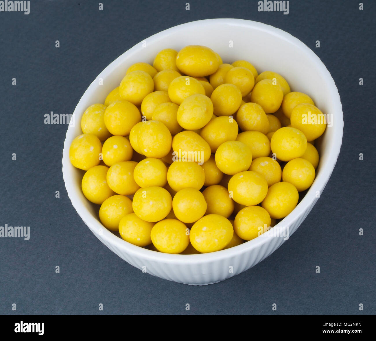 Peanuts. Covered Peanuts on the background Stock Photo - Alamy