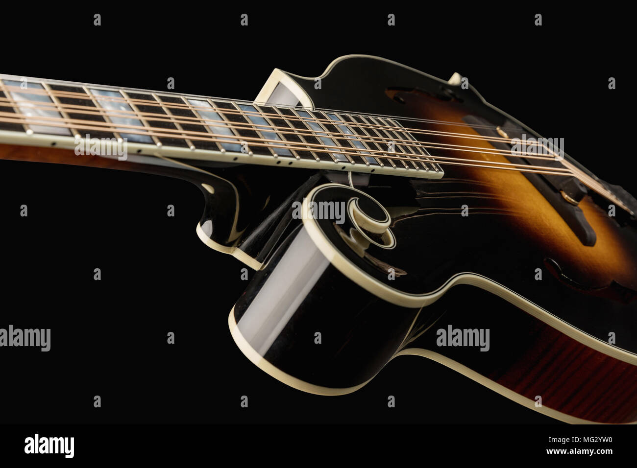 Mandolin isolated on black background. Music concept Stock Photo - Alamy