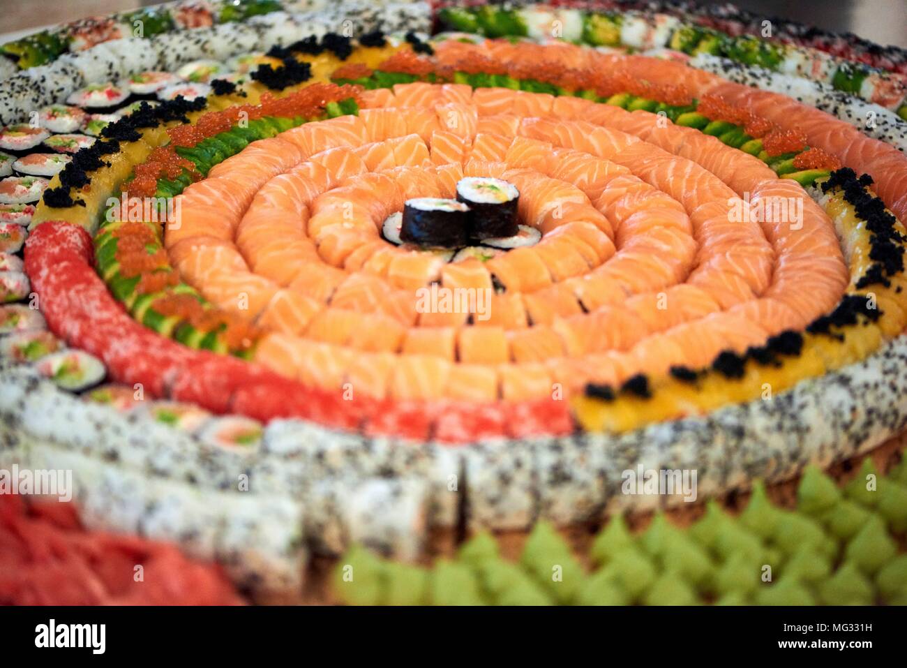 Big restaurant catering includes many sushi rolls types,made with ...