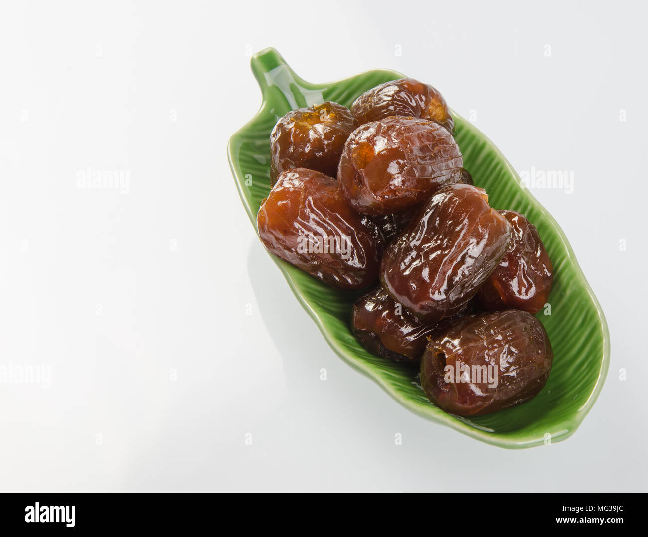 Dried preserved. Sweet syrup monkey apple or Chinese date on the ...