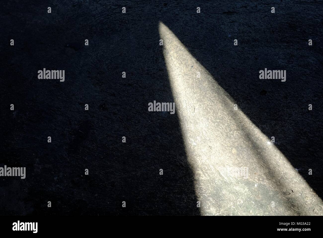 Sunlight Beam on Ground Stock Photo - Alamy