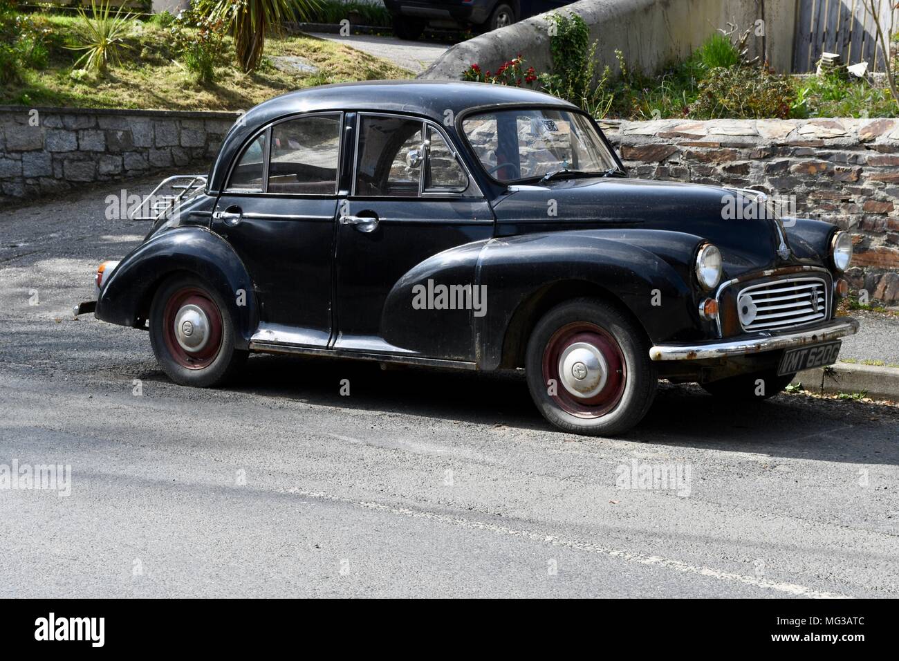 Morris Minor 1000 with baggage rack parked in Tywardreath Stock Photo ...