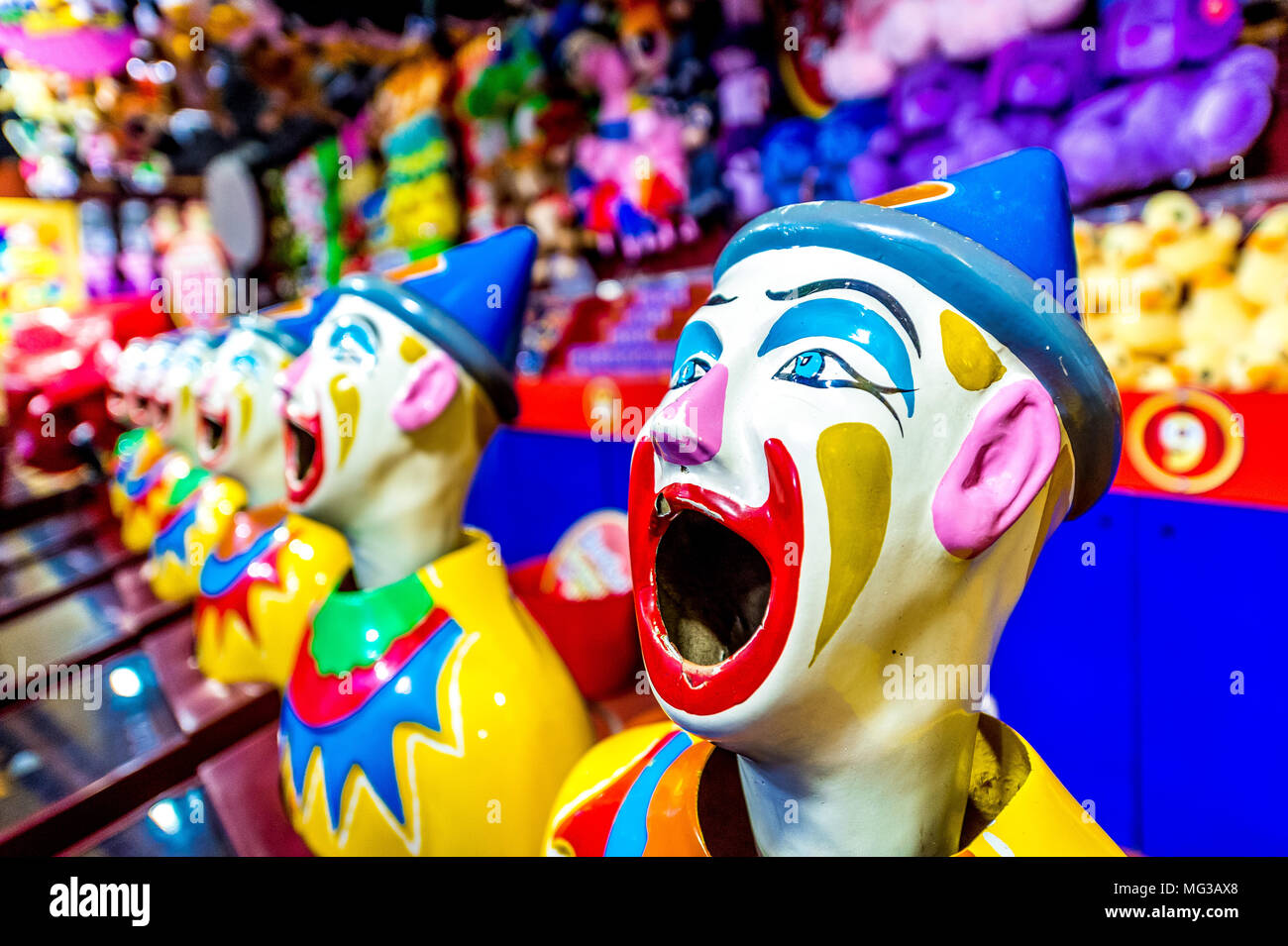 Clown faces game at Luna Park at night in Sydney, Australia Stock Photo ...
