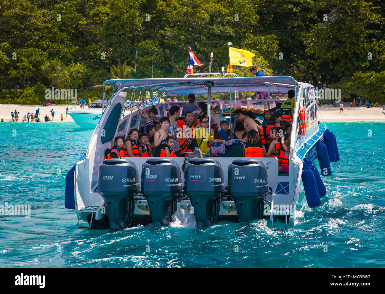 PHUKET, THAILAND - JAN 25, 2016: Speed boat with four engines full of ...