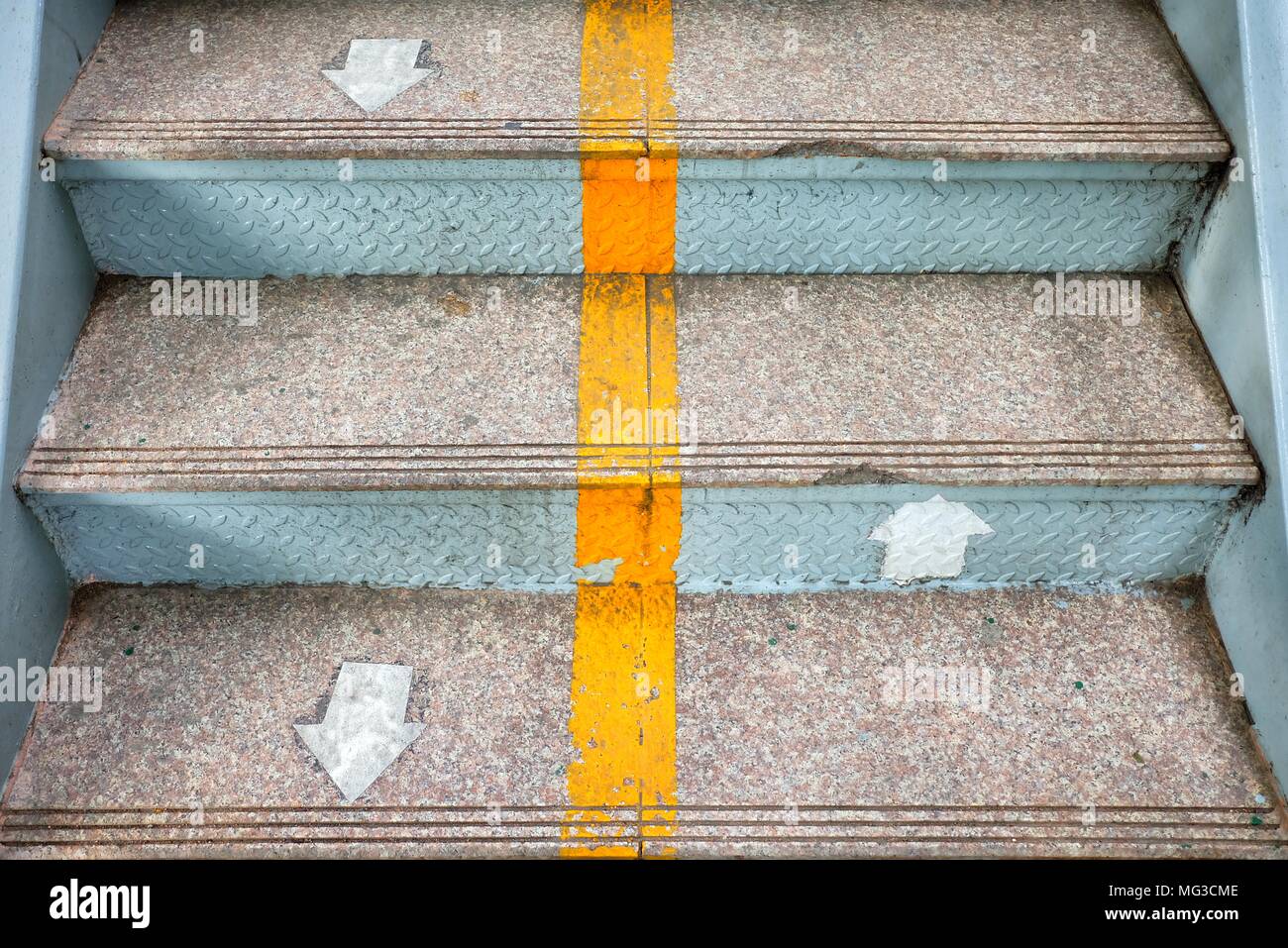 Up and Down Arrows on Stair Stock Photo - Alamy