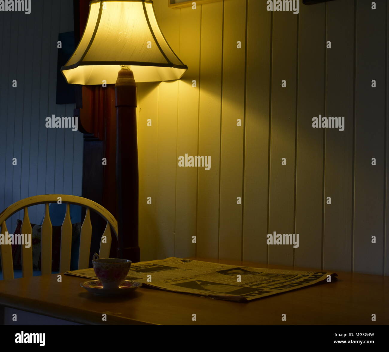 READING BY CANDLE LIGHT Stock Photo - Alamy