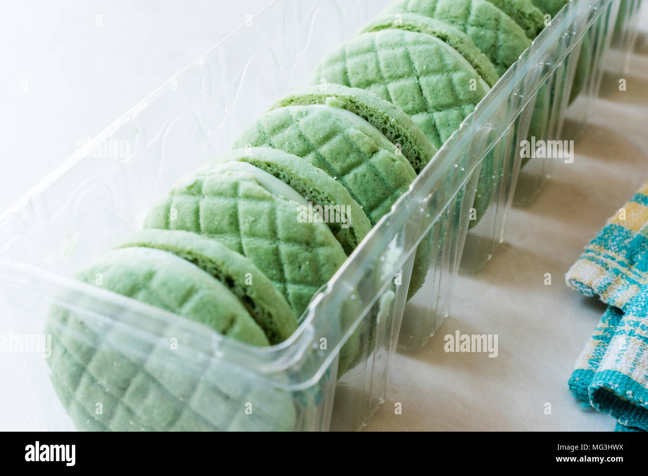 Cream Filled Green Round Lime Cookies / Macarons in Plastic Container ...