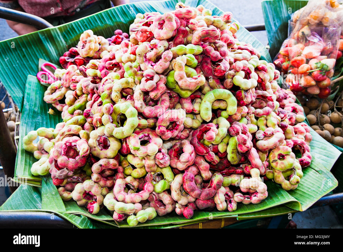 Manila tamarind for sale at the street food market in Bangkok, Thailand ...