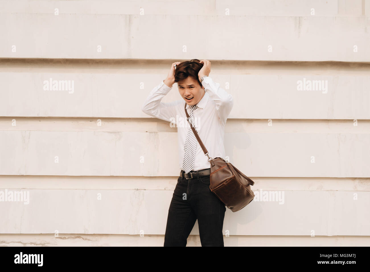 portrait of a lonely man in a urban street feeling sad Stock Photo - Alamy