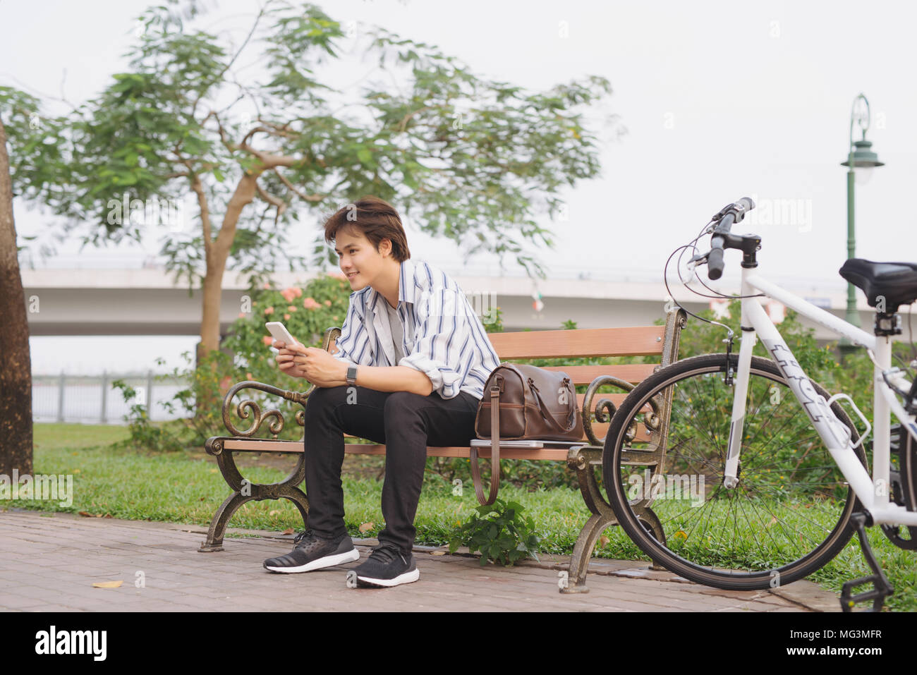 Indian man on bicycle hi-res stock photography and images - Alamy
