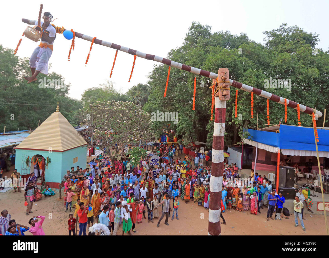Charak Puja, Bangladesh. 26th April 2018. A young devotee hanging from ...