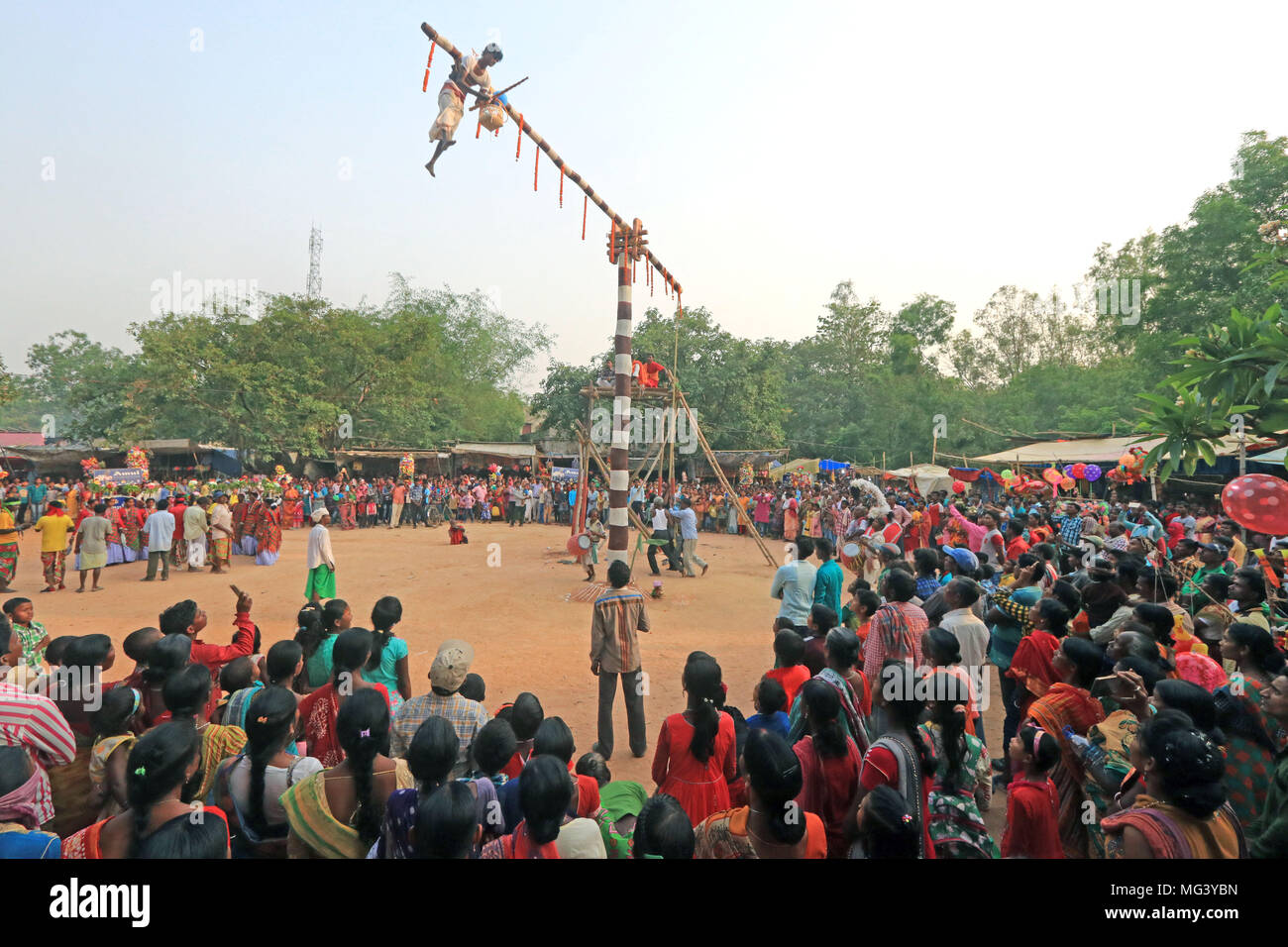 Charak Puja, Bangladesh. 26th April 2018. Tribal people watch ...