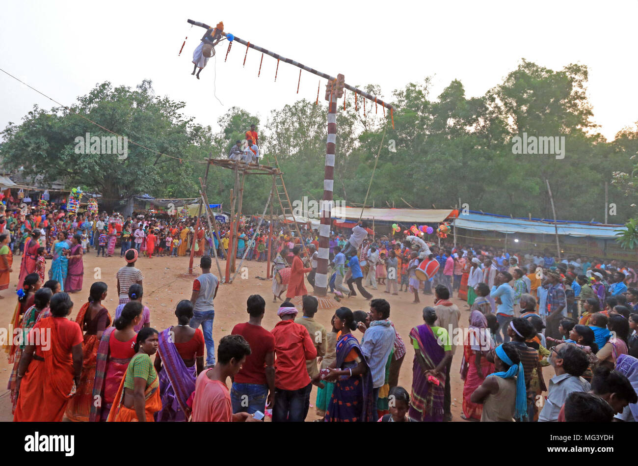 Charak Puja, Bangladesh. 26th April 2018. Tribal people watch ...