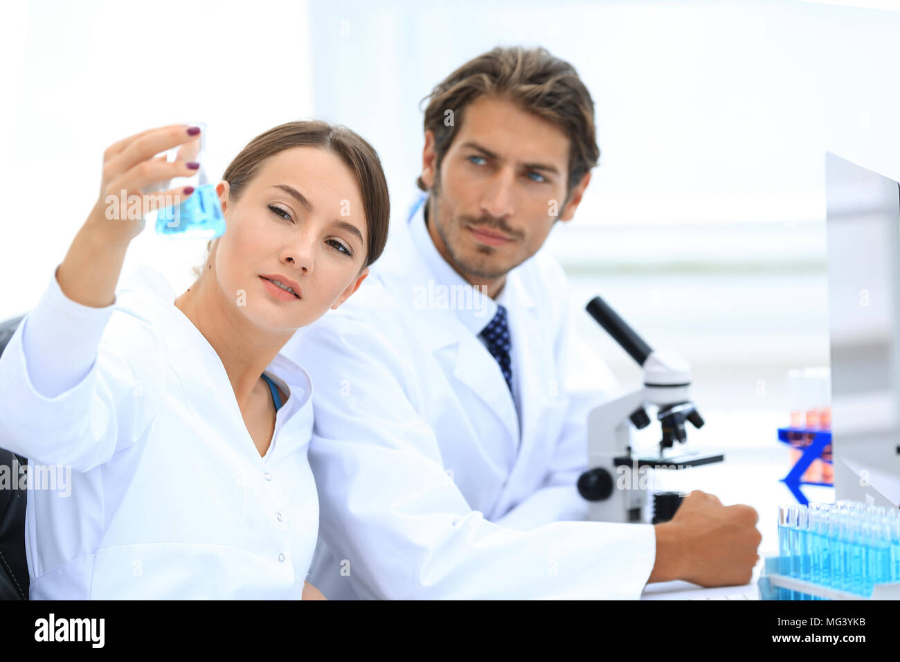 Team of Biologists Researchers Working in Laboratory Stock Photo - Alamy