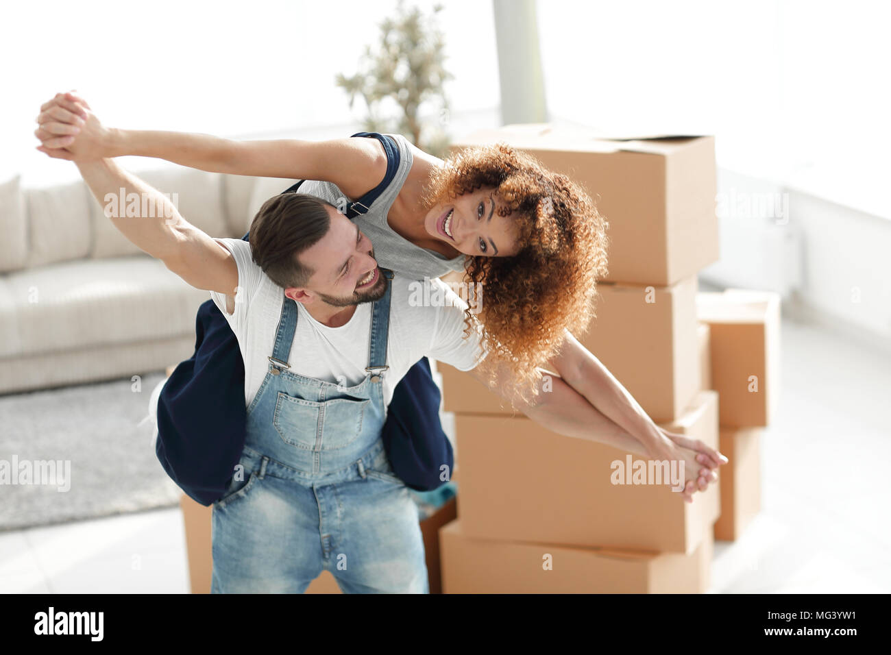 Happy married couple in a new house Stock Photo - Alamy