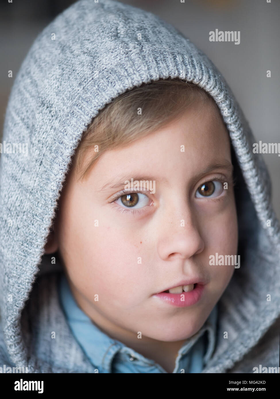 Handsome young guy looking at the camera Stock Photo - Alamy
