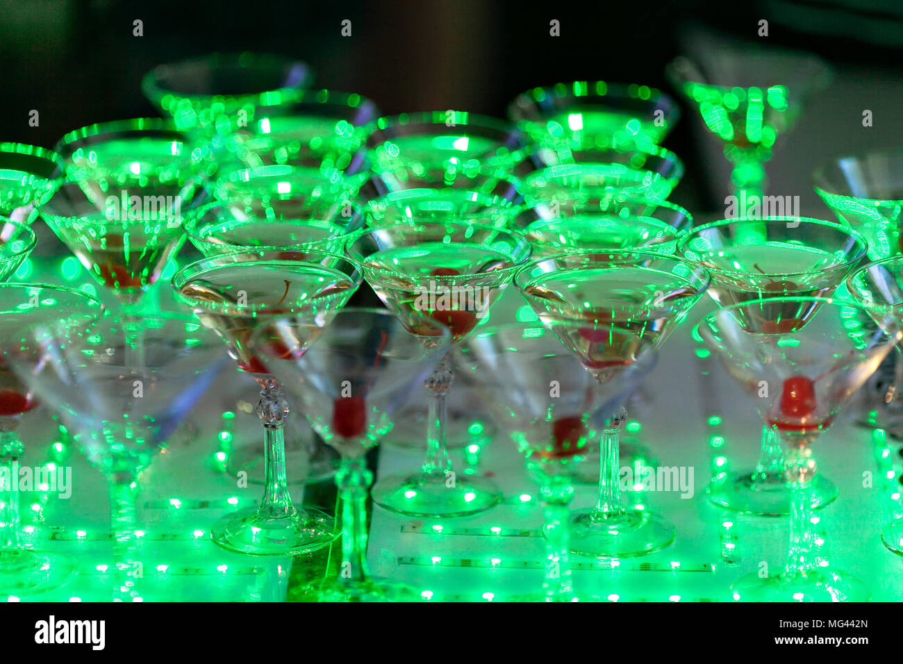 Champagne glass pyramid on wedding party. Tower of glasses of wine ...