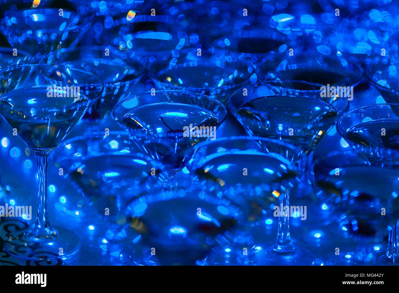 Champagne glass pyramid on wedding party. Tower of glasses of wine ...