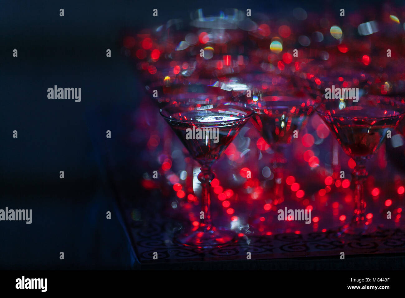Champagne glass pyramid on wedding party. Tower of glasses of wine ...