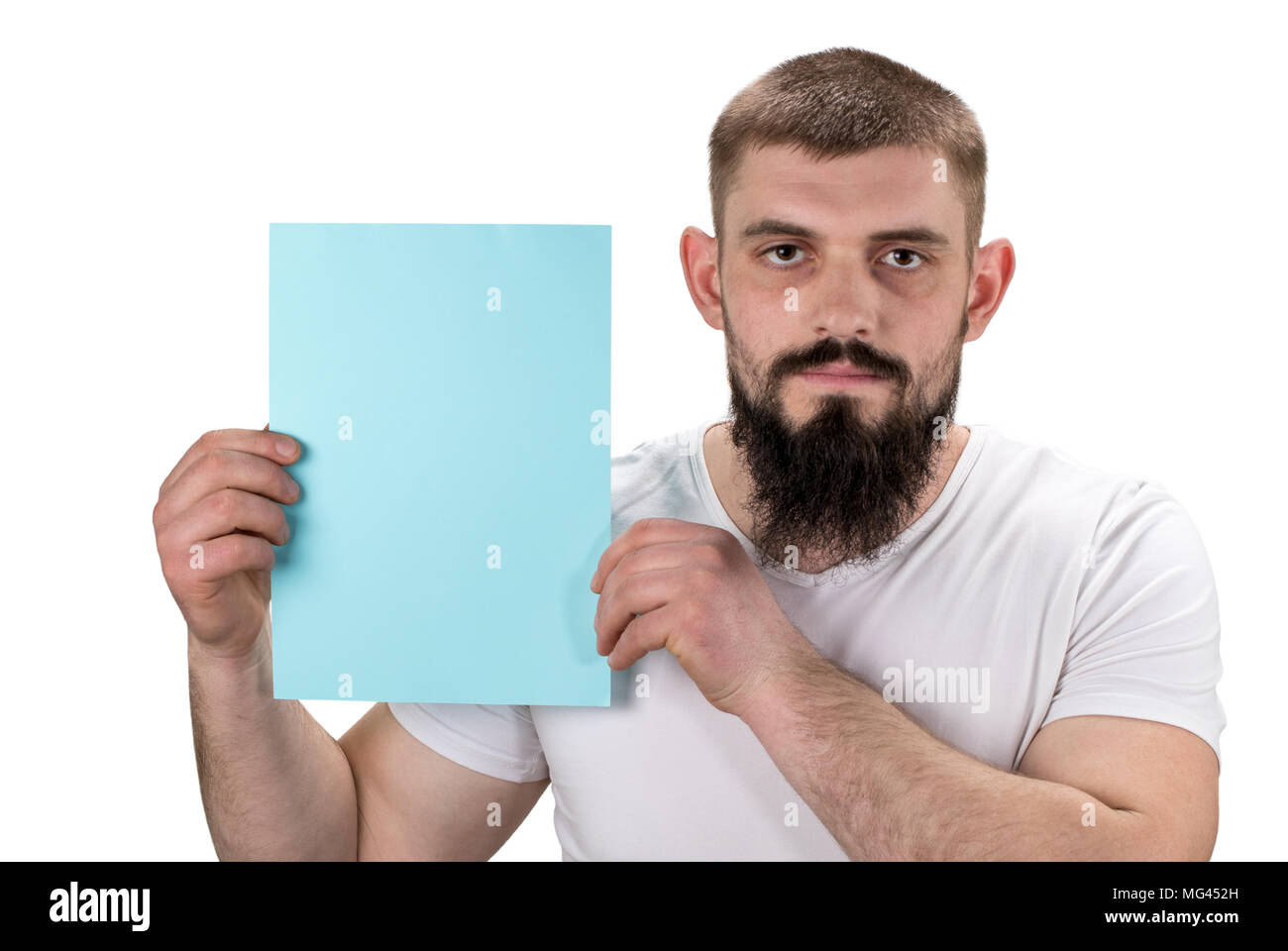 Smiling young man holding blank sign in hands isolated on white ...