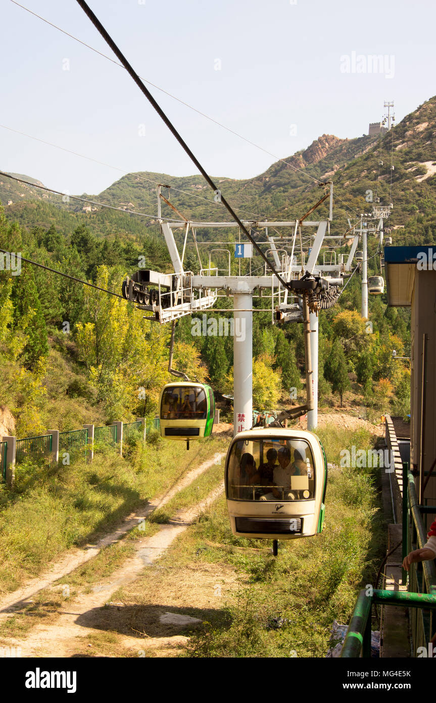 Cable cars transporting visitors to the Great Wall of China at Badaling ...