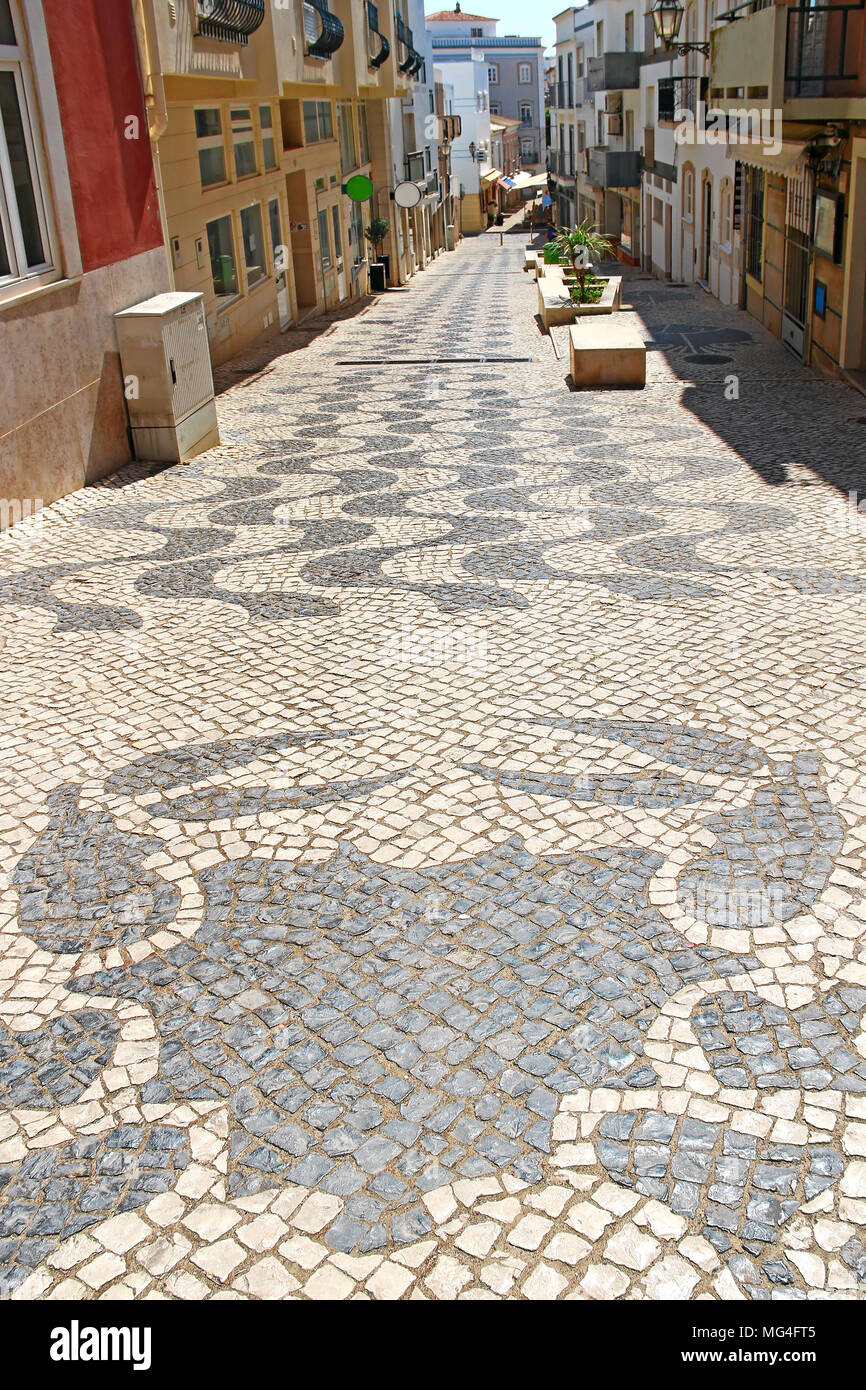 Street of Lagos with tiled pavement, Algarve, Portugal Stock Photo - Alamy