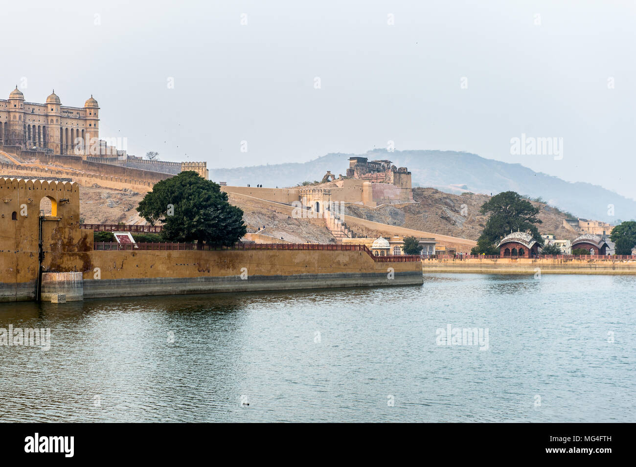 View of the Amer Fort (Amber Fort and Amber Palace) and the lake Jaipur ...